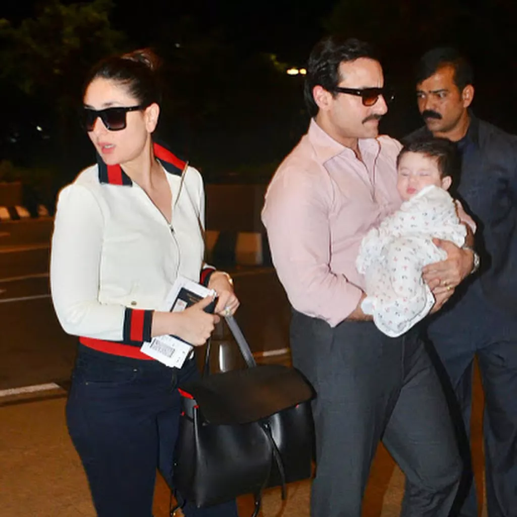 New Pics Of Taimur Sleeping In Daddy Saif's Arms Before Flying To Alps ...