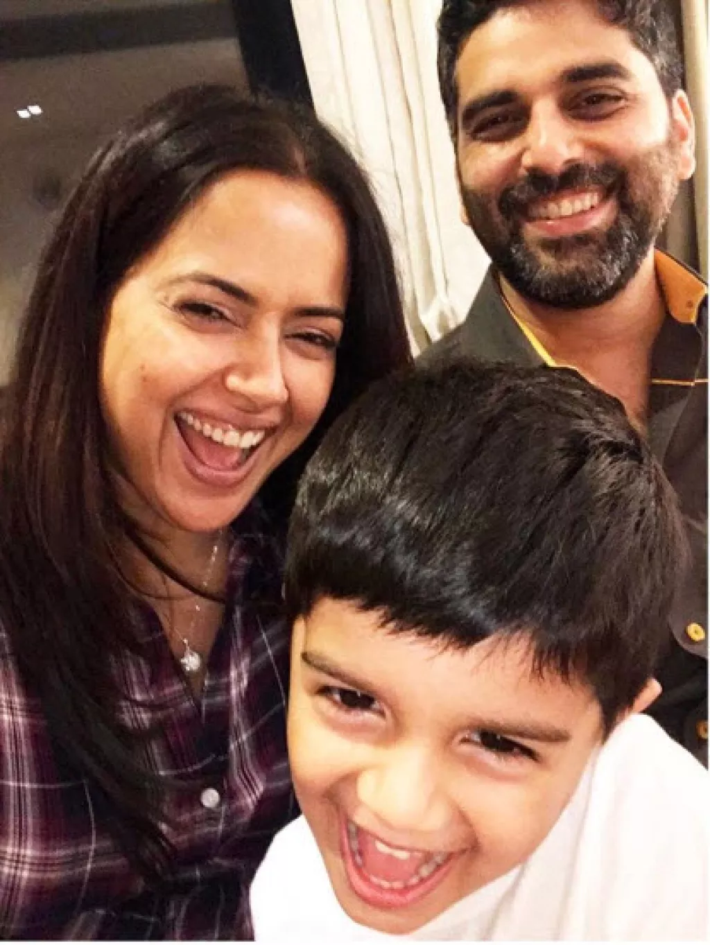 Sameera Reddy's Son Hans Brings His Newborn Sister Home Cuddled In His ...