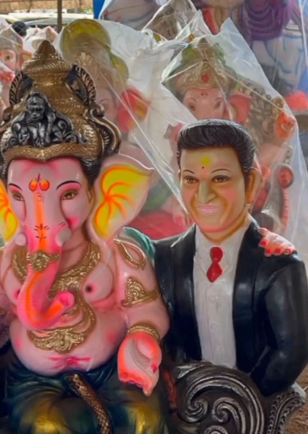 Puneeth Rajkumar's Fans Bring Home Late Actor's Idol Along With Lord ...