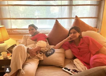 'Maasi', Rhea Kapoor Cuddles Vayu To Sleep While His Mommy, Sonam ...