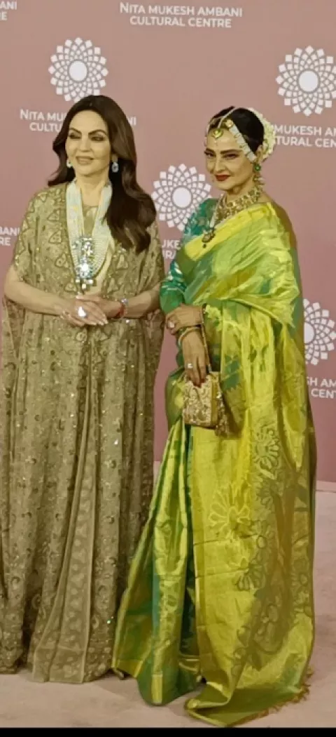 Nita Ambani Dons A Golden Valentino Gown, Pairs It With Abu Jani-Sandeep Khosla Cape At NMACC Day 2