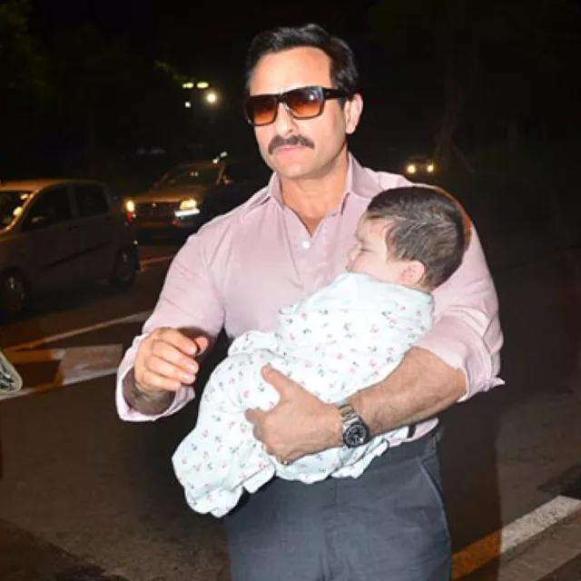 New Pics Of Taimur Sleeping In Daddy Saif's Arms Before Flying To Alps ...