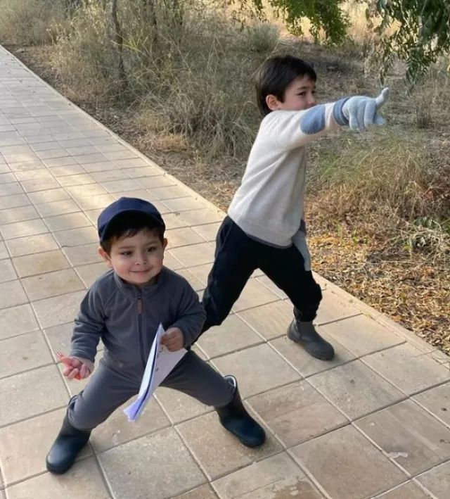 Taimur And Jehangir Look Adorable As They Strike A Goofy Pose For 'Bua ...