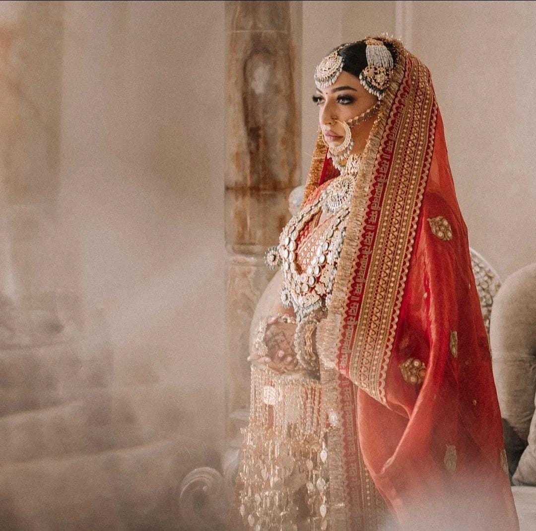 Sabyasachi Bride Stuns In A Red Lehenga With Golden Work, Pairs With ...